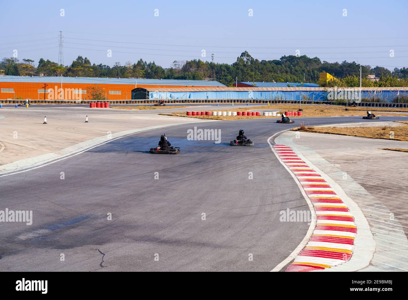 Go-kart racing on the professional track Stock Photo - Alamy