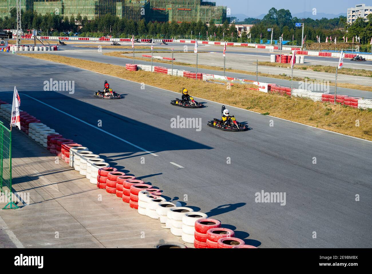 Go-kart racing on the professional track Stock Photo - Alamy