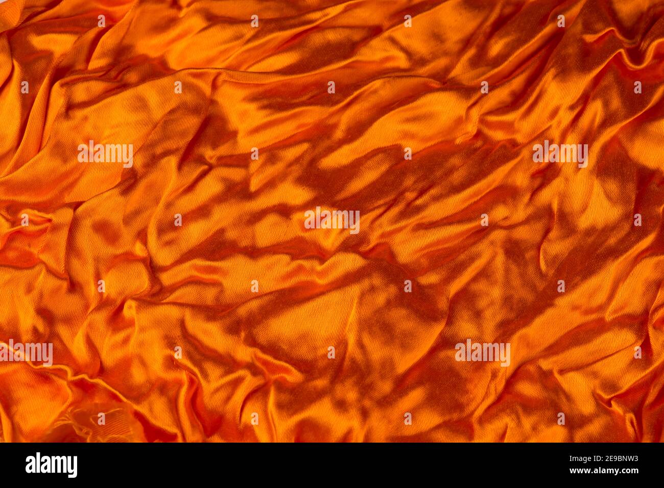 Orange silk fabric hi-res stock photography and images - Alamy