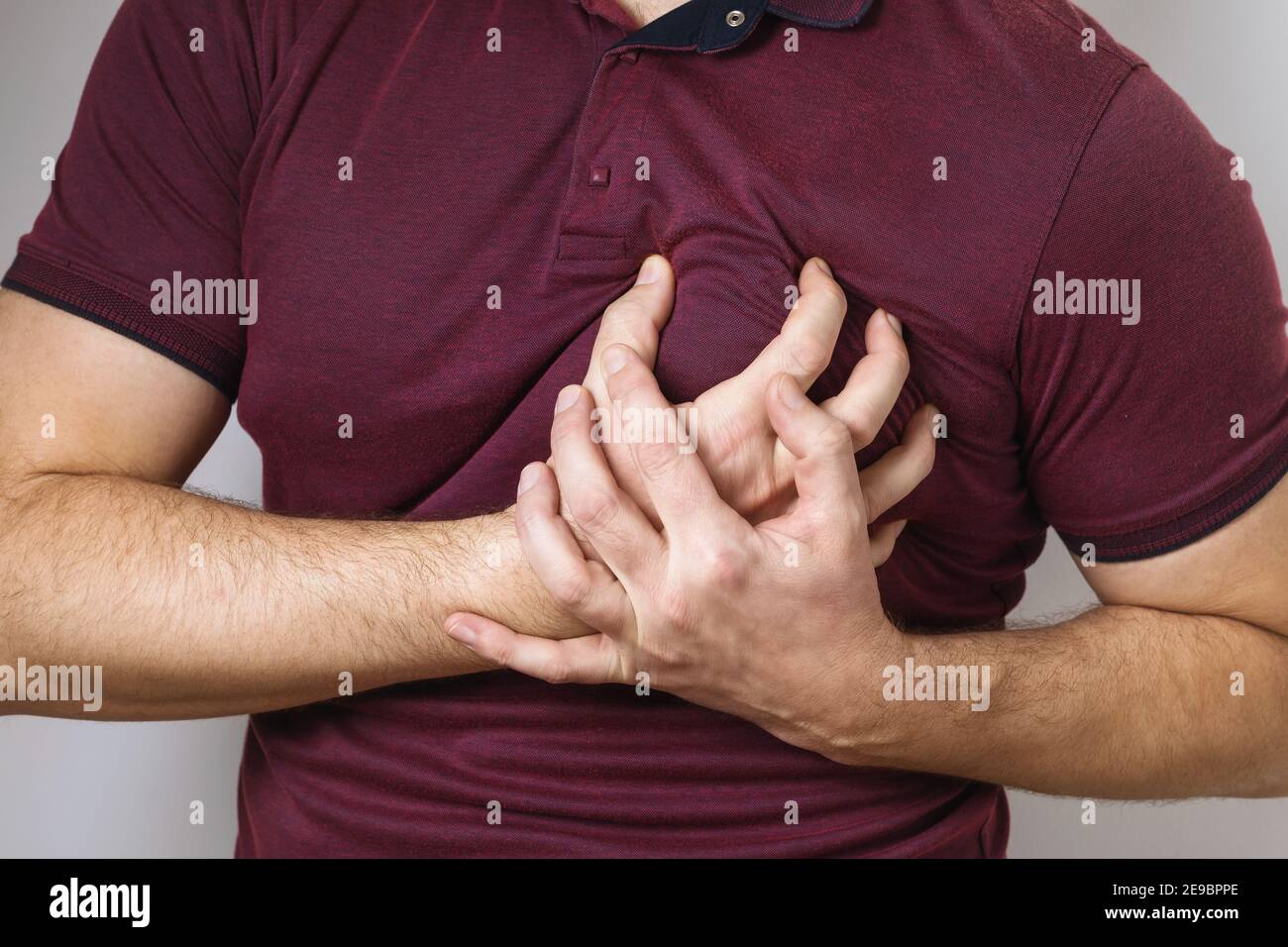 Man holds his hands in the area of the heart. Concept on the topic of ...