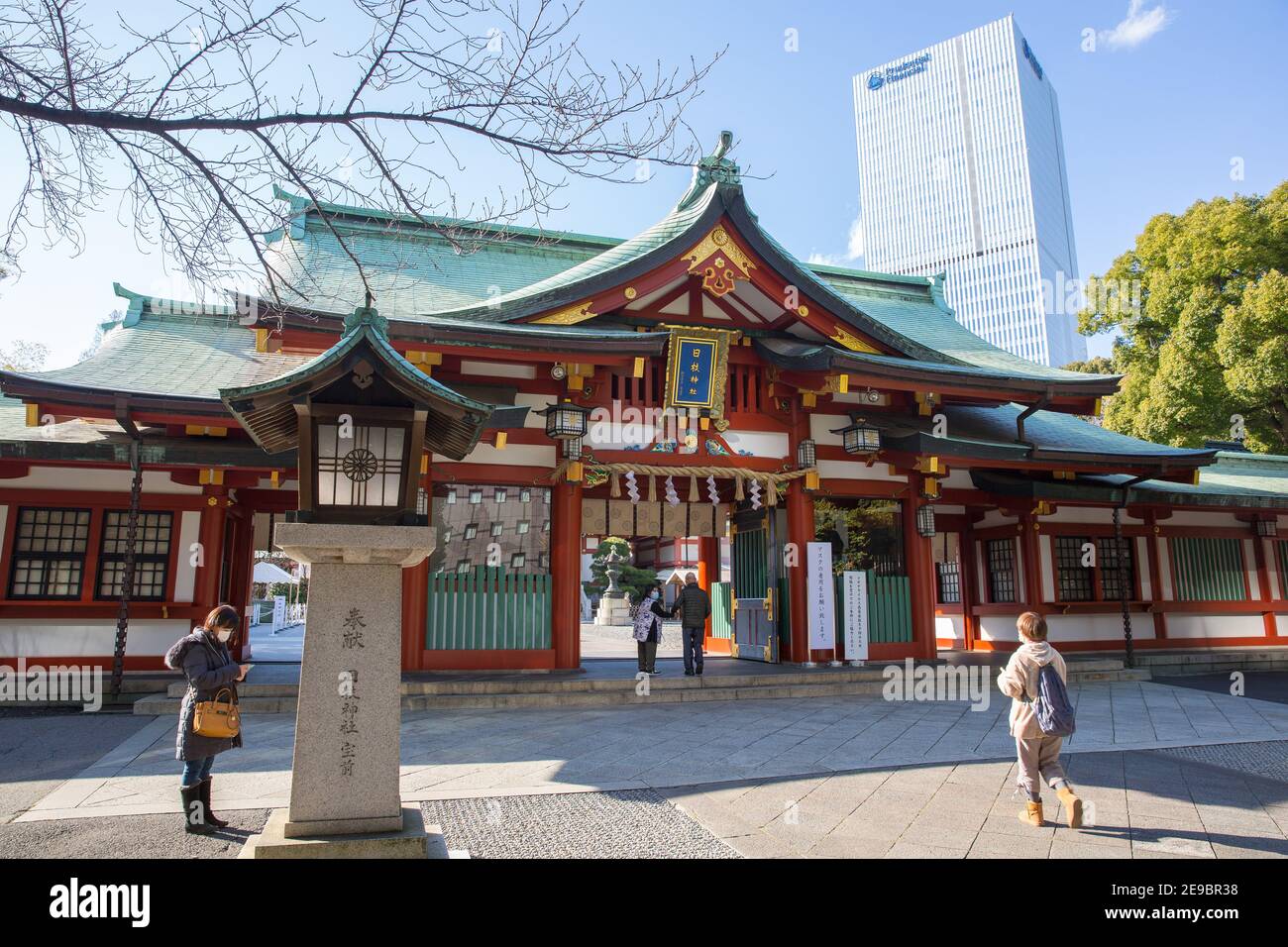 People entering the Hie Shrine in Nagatach?, Chiyoda, Tokyo. (Photo by ...