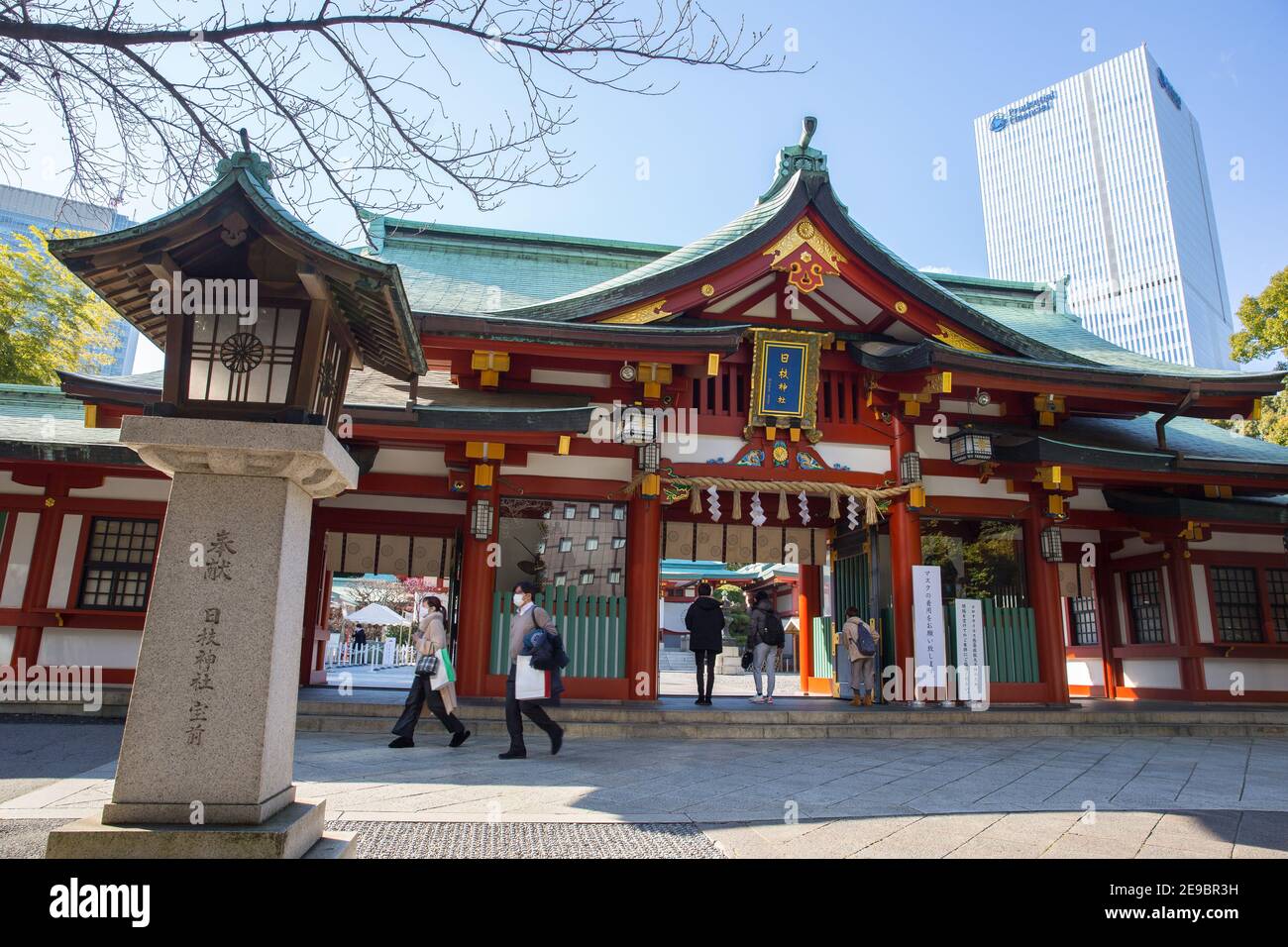People entering the Hie Shrine in Nagatach?, Chiyoda, Tokyo. (Photo by ...