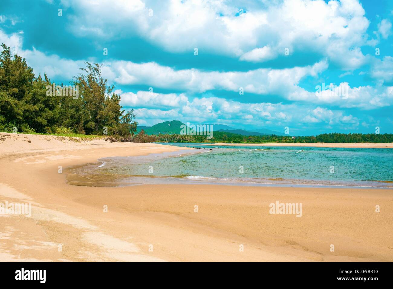 Scenic seascape. Yellow sand beach, azure sea and blue sky with ...