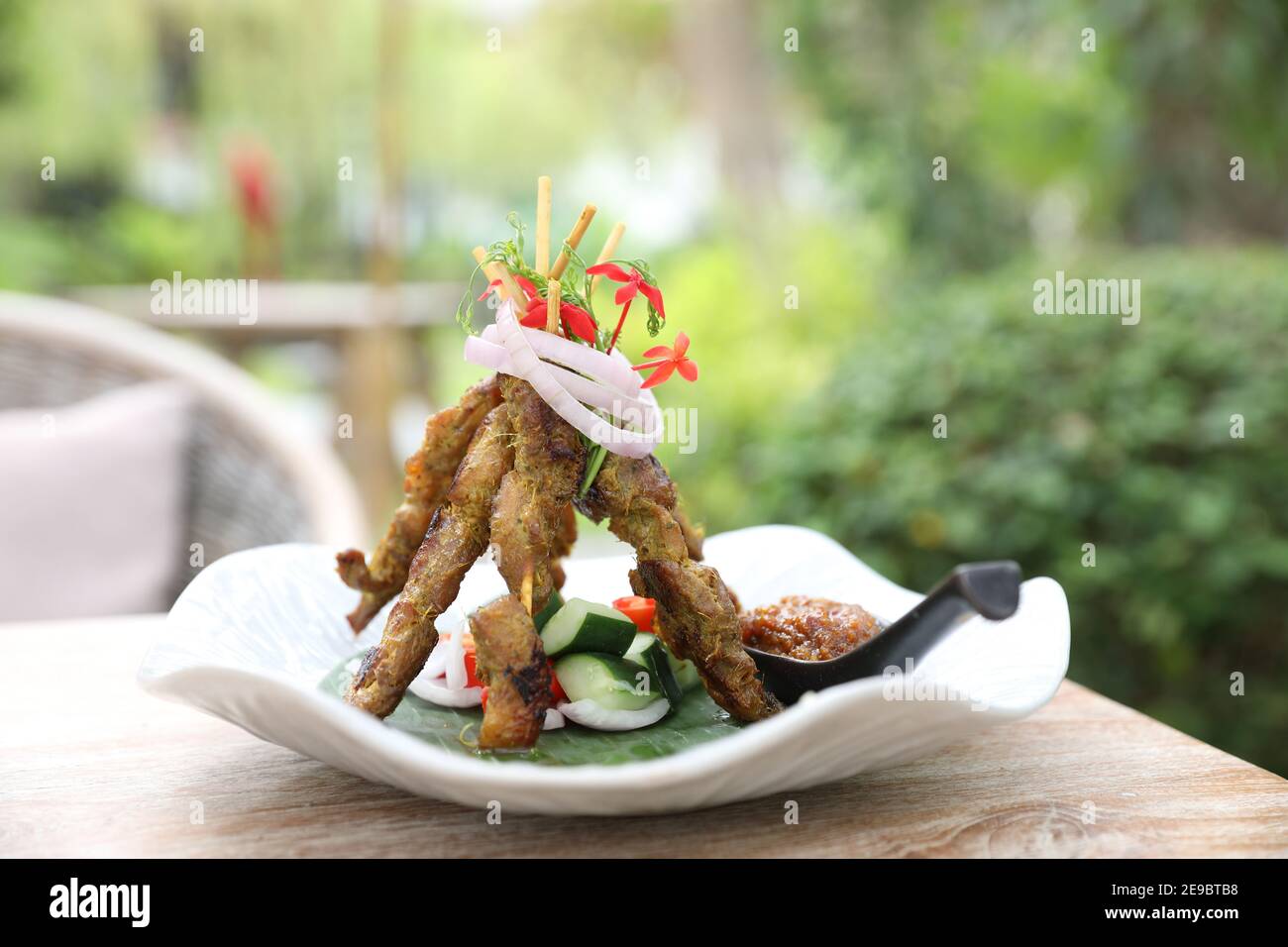 Chicken Satay on dark brown table street food appetizer Stock Photo - Alamy