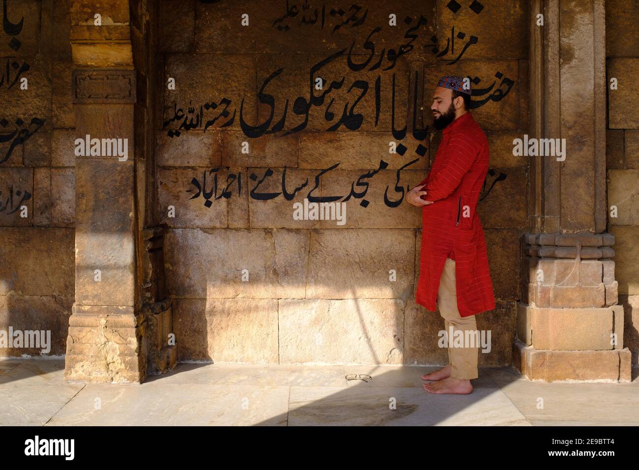 A Muslim man offering prayers at Jama mosque of Ahmedabad Stock Photo ...