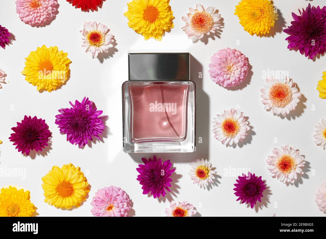 Perfume bottle for women in flower buds Stock Photo - Alamy