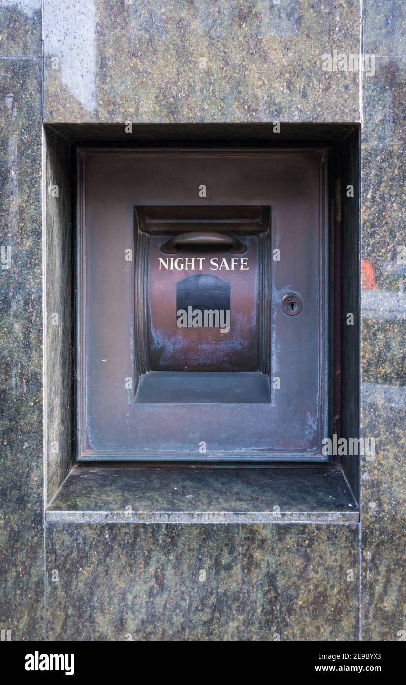 An old Lloyds Bank night safe set into the wall of the former bank ...