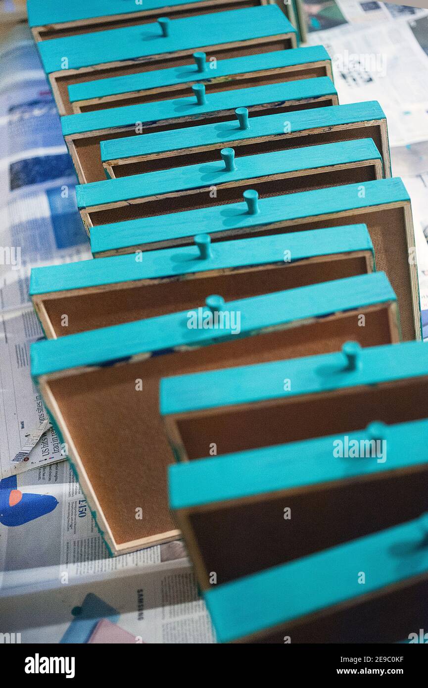 Freshly painted teal coloured drawers Stock Photo - Alamy