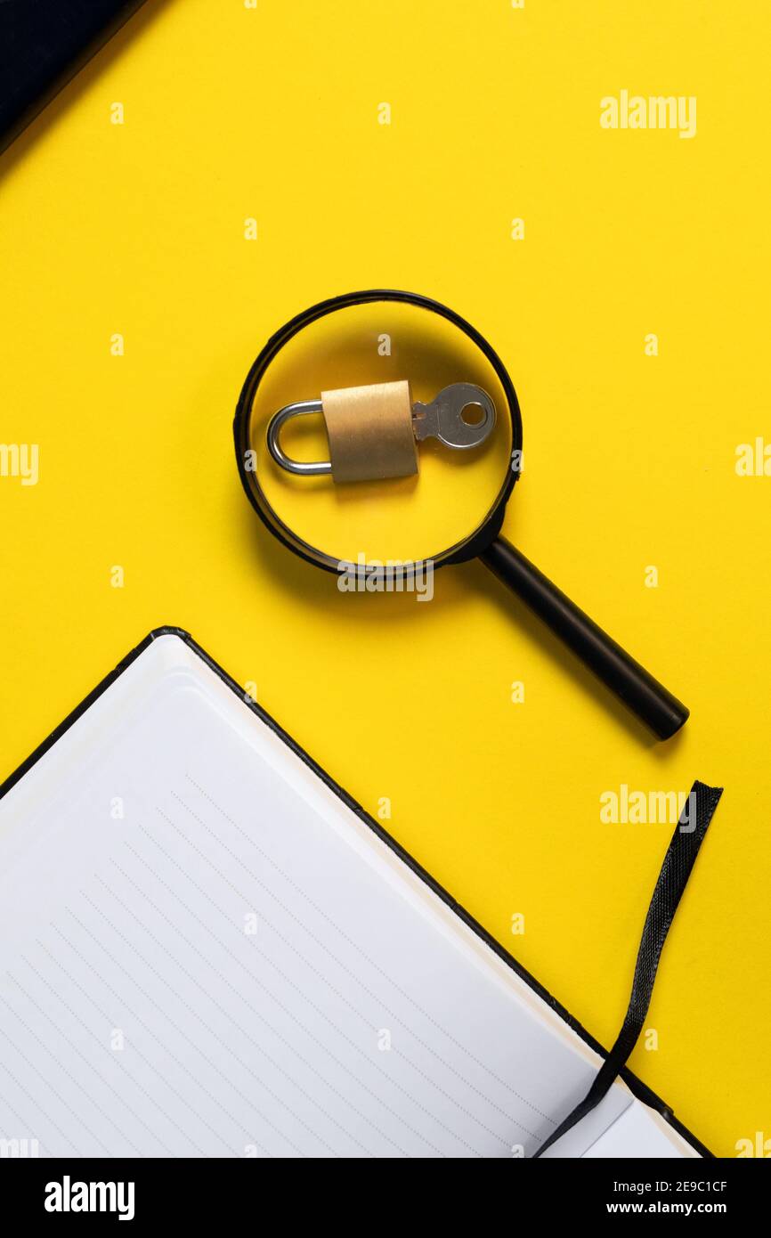 Magnifying glass keyhole on hi-res stock photography and images - Alamy