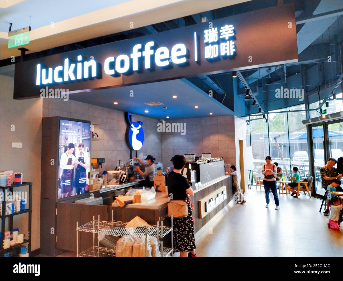 SHANGHAI, CHINA - AUGUST 8, 2020 - Customers consume coffee at a Luckin ...