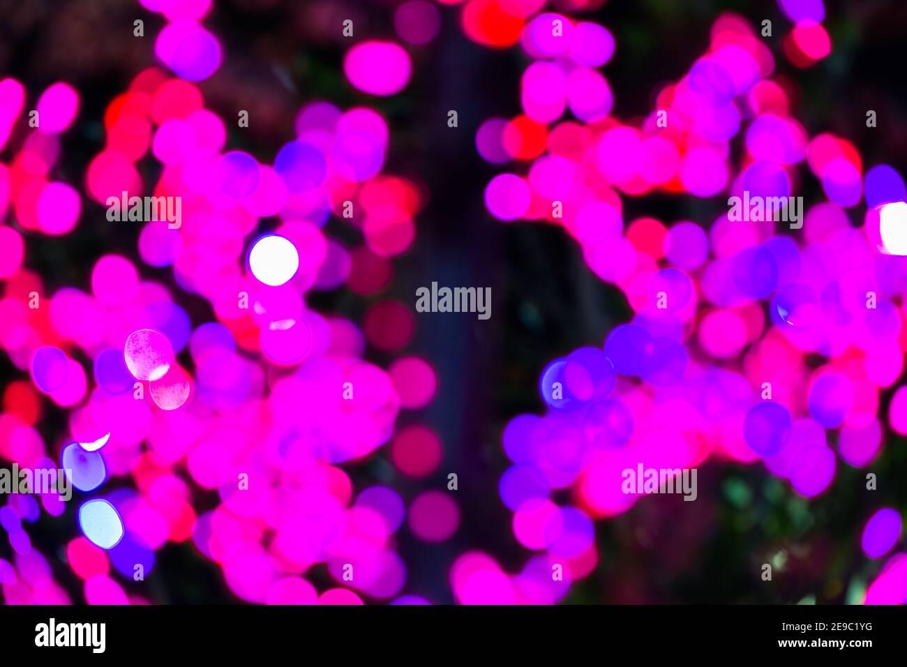 Multicolored defocused lights background Stock Photo - Alamy