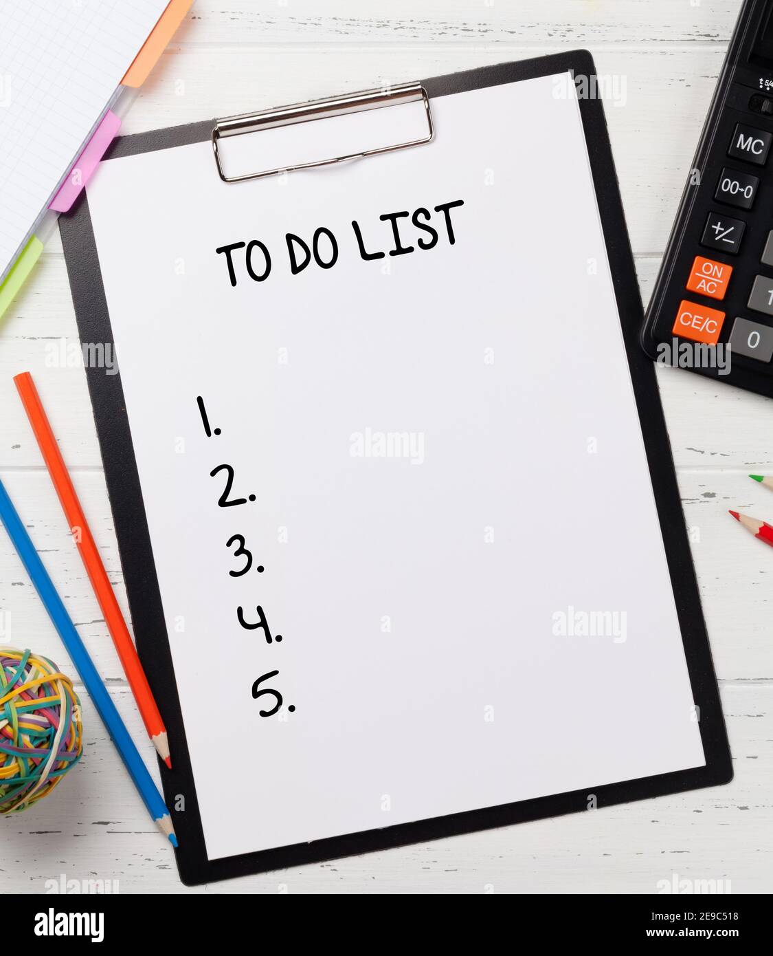 Office workplace table with to do list page and supplies. Flat lay. Top ...