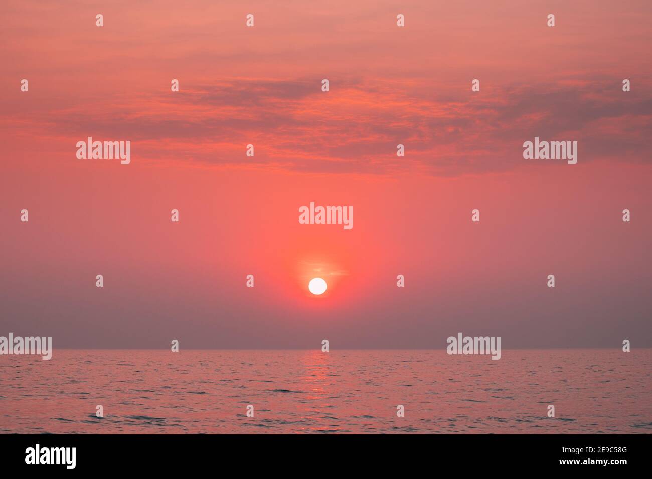 Sundown Above Sea Horizon At Sunset. Natural Sunrise Sky Warm Colors ...