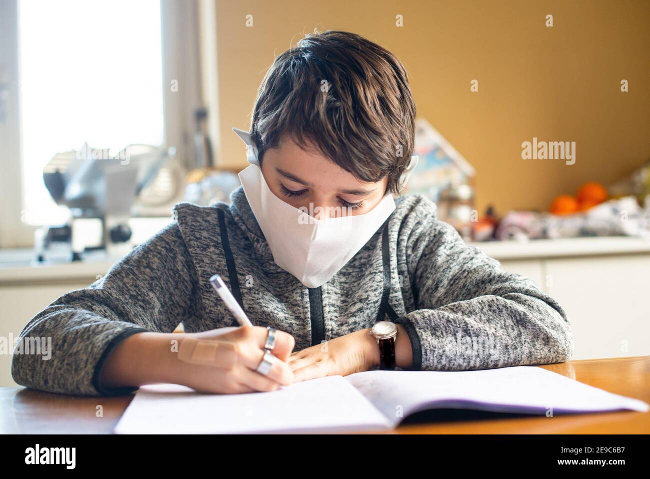 12 year old student writing hi-res stock photography and images - Alamy