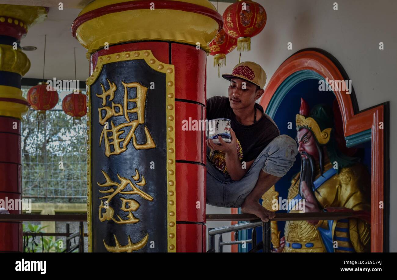 Malang, east java, Indonesia. 4th Feb, 2021. Devotees clean and ...