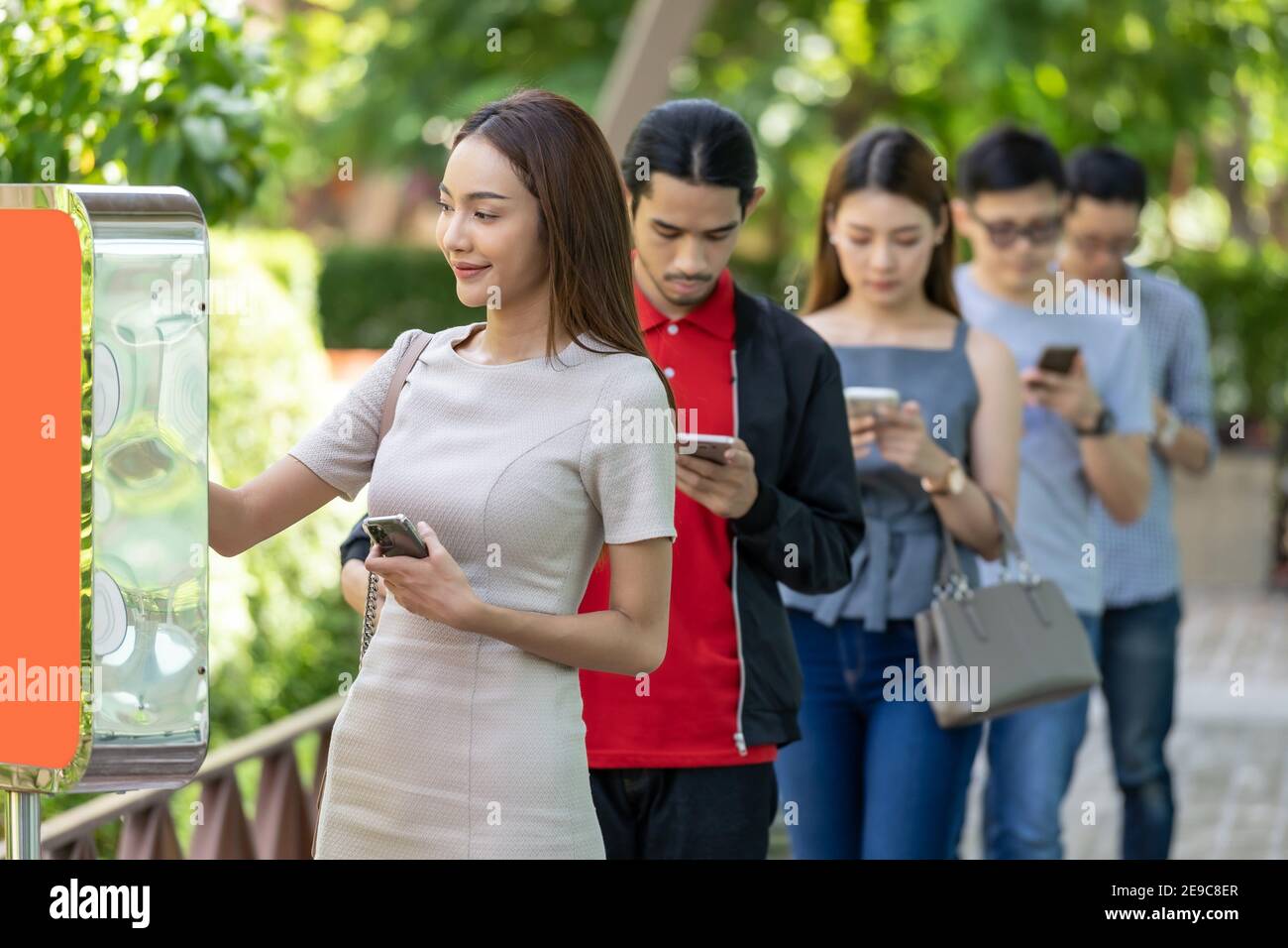 Queue system machine hi-res stock photography and images - Alamy