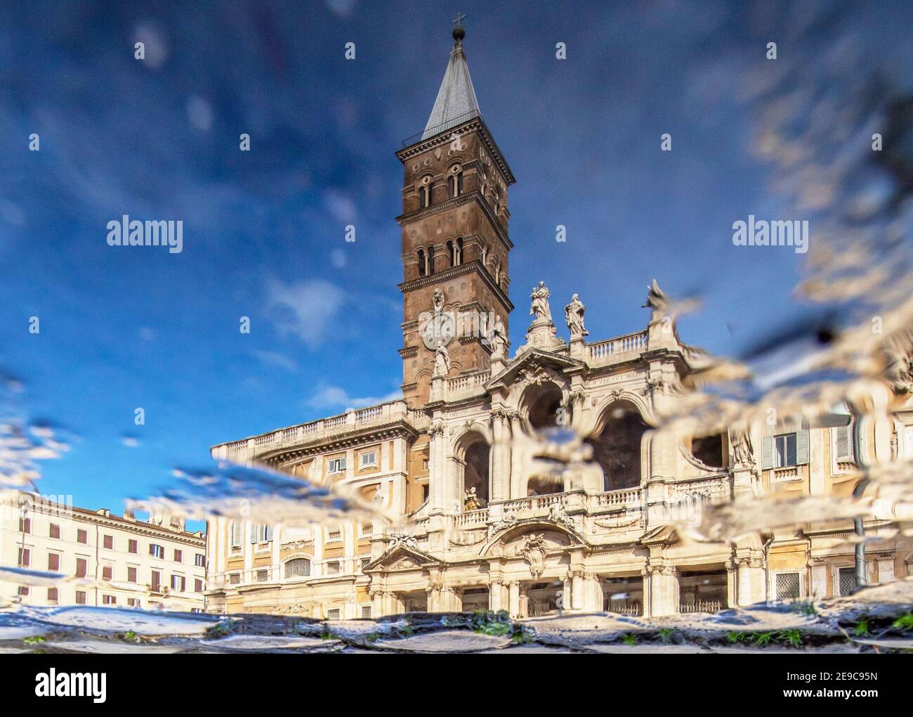 Frequent rain showers create pools in which the wonderful Old Town of ...