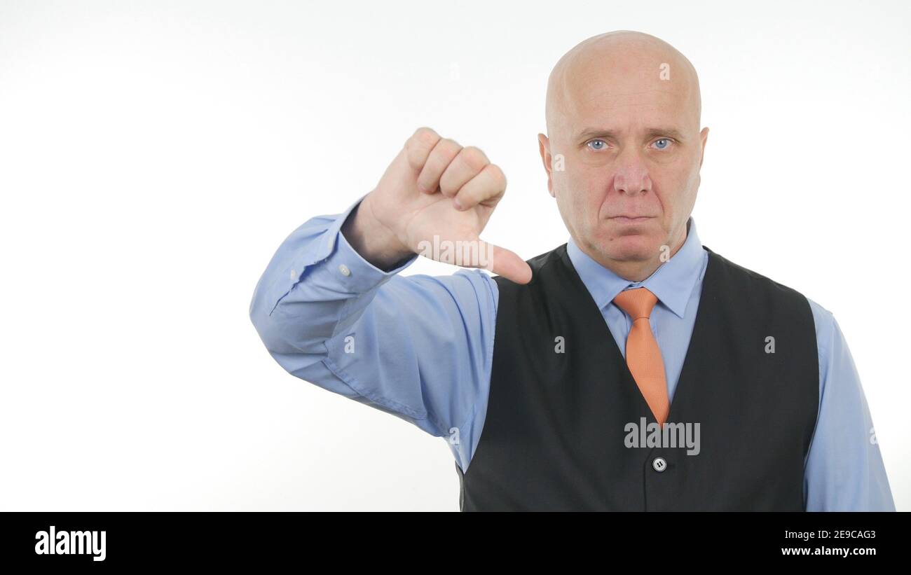 Businessman Makes Dislike Hand Sign. One Person Making Thumbs Down Hand ...