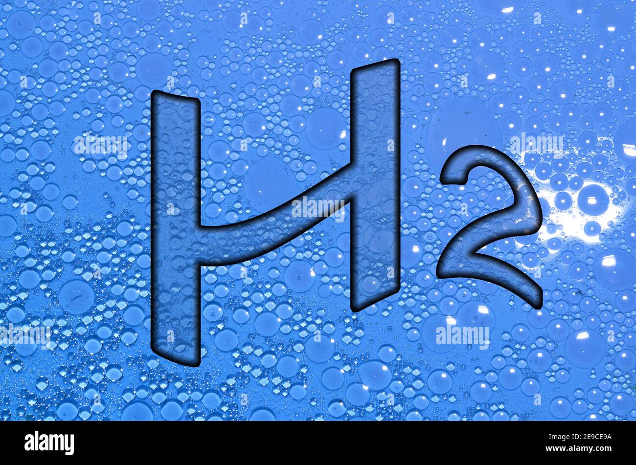 wavy h2 hydrogen letters with lot of circles in blue water Stock Photo ...