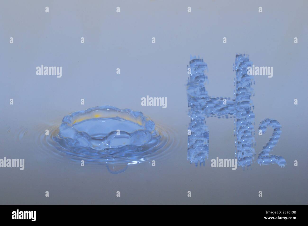 hydrogen h2 letters and a drop impact in a blue fluid Stock Photo - Alamy