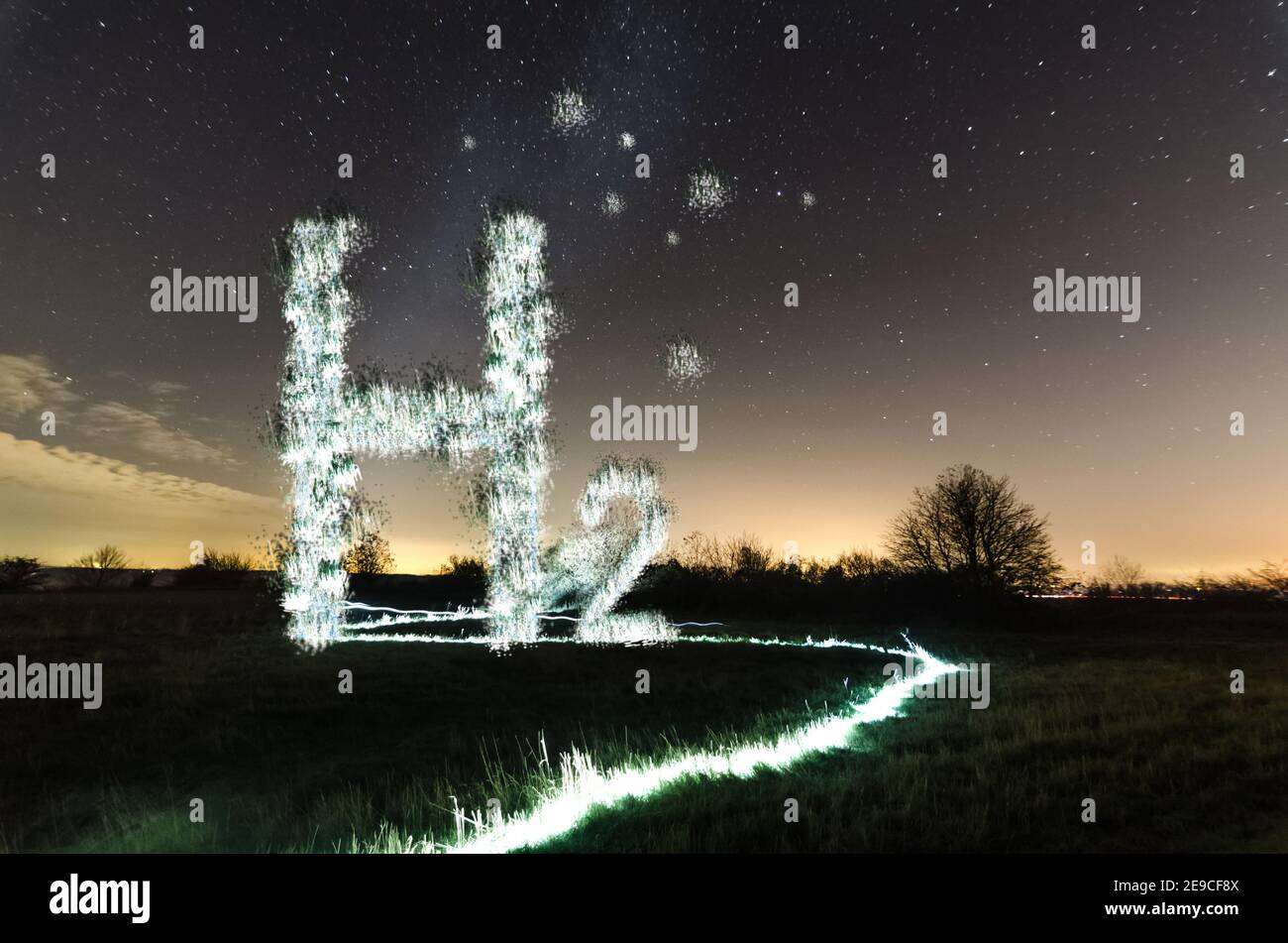 burning hot hydrogen h2 letters with a light trail and starry sky Stock ...