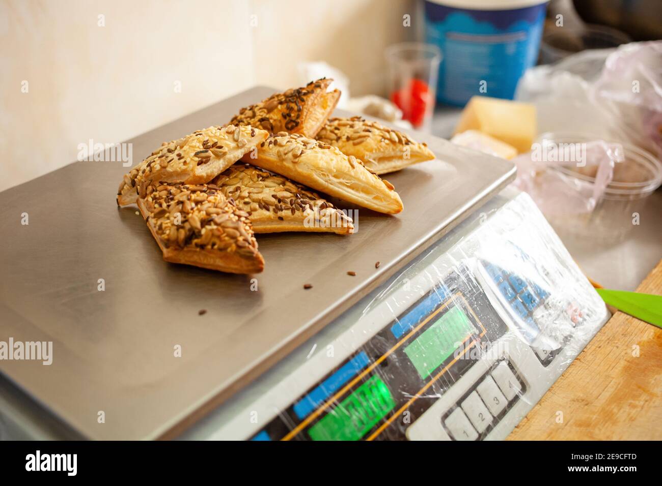 Baking with seeds, herbs on electronic scales. Natural light from the ...