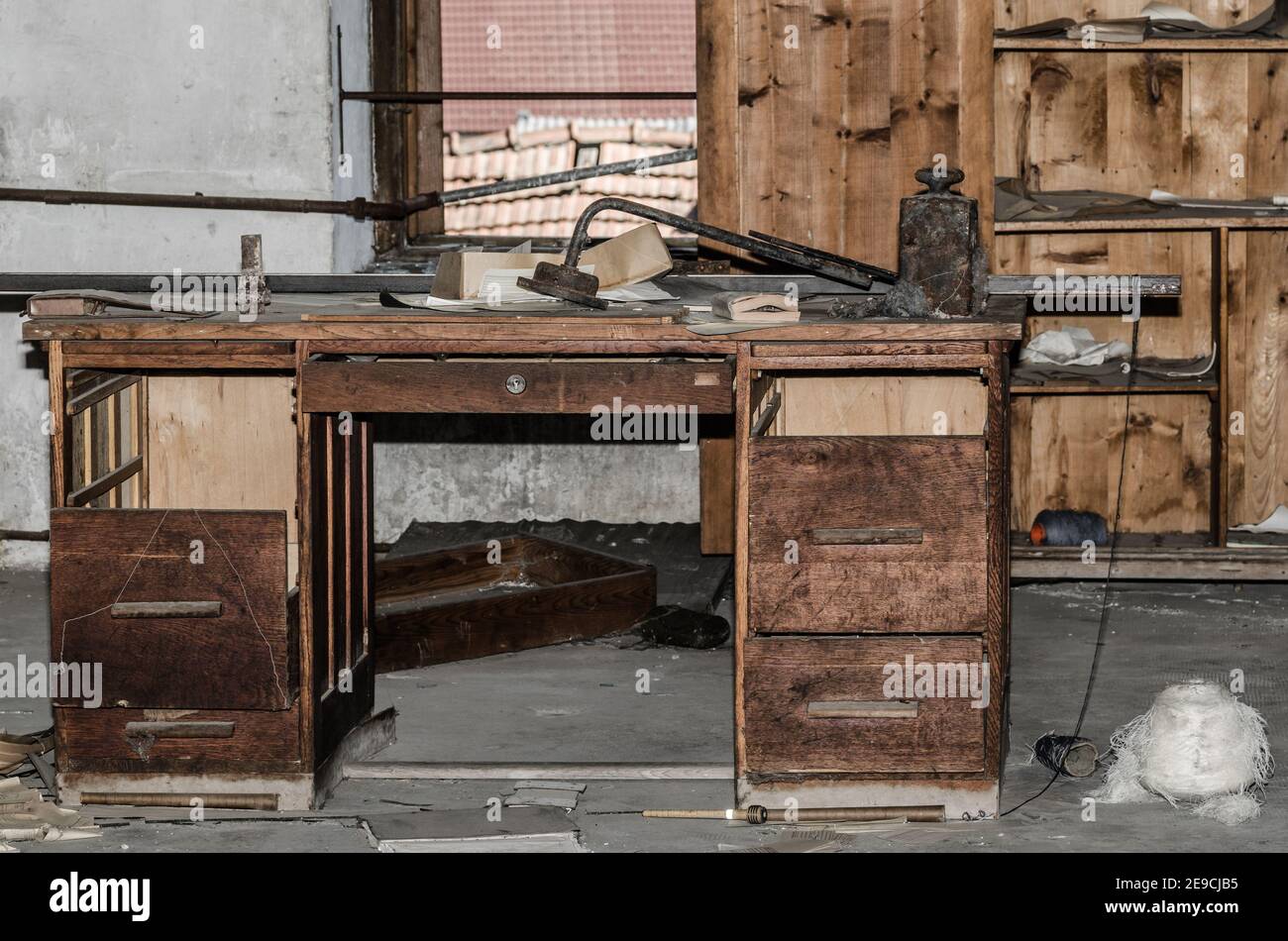 old wooden desk in a factory Stock Photo - Alamy