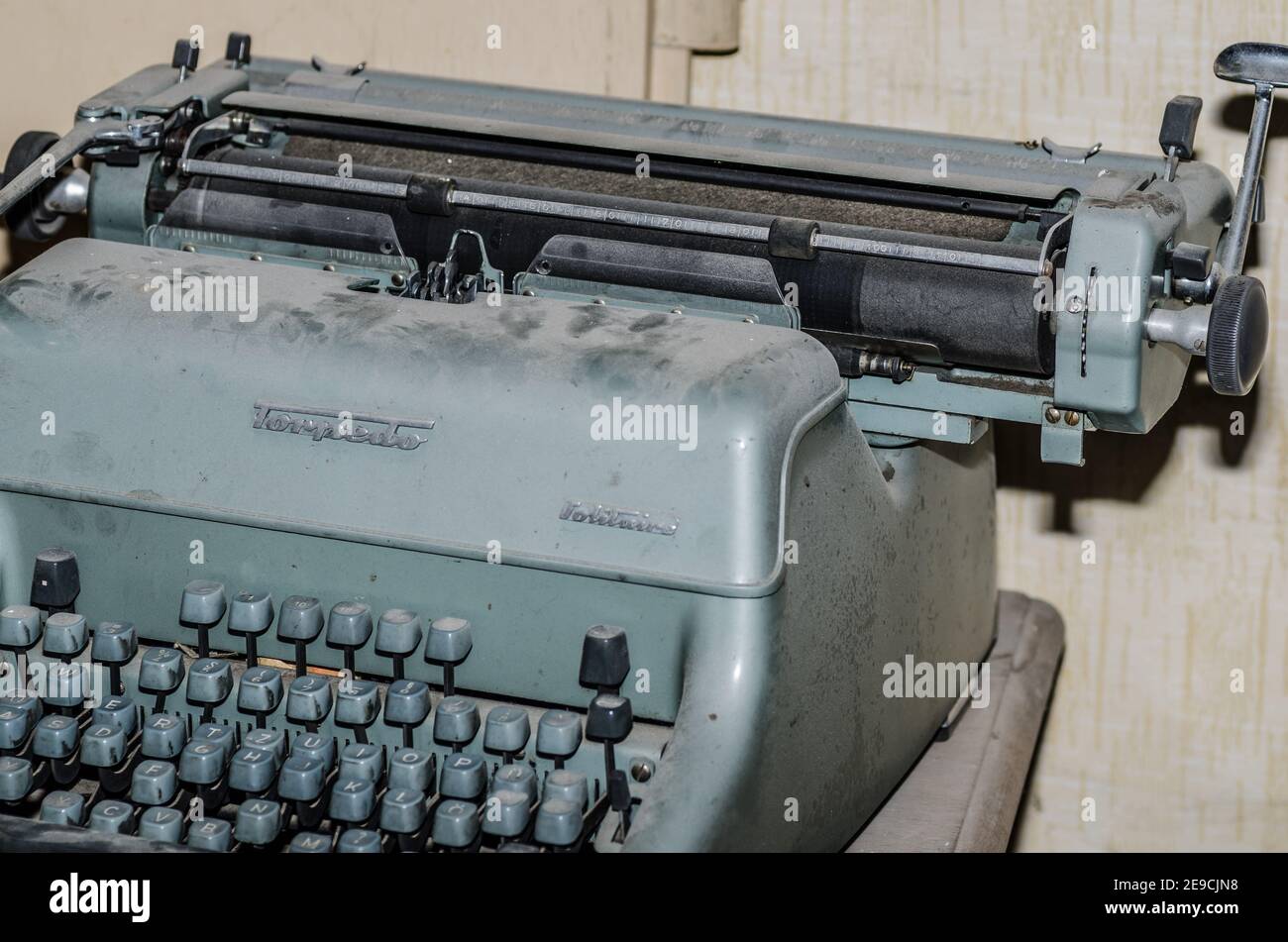 old blue typewriter in abandoned house Stock Photo - Alamy