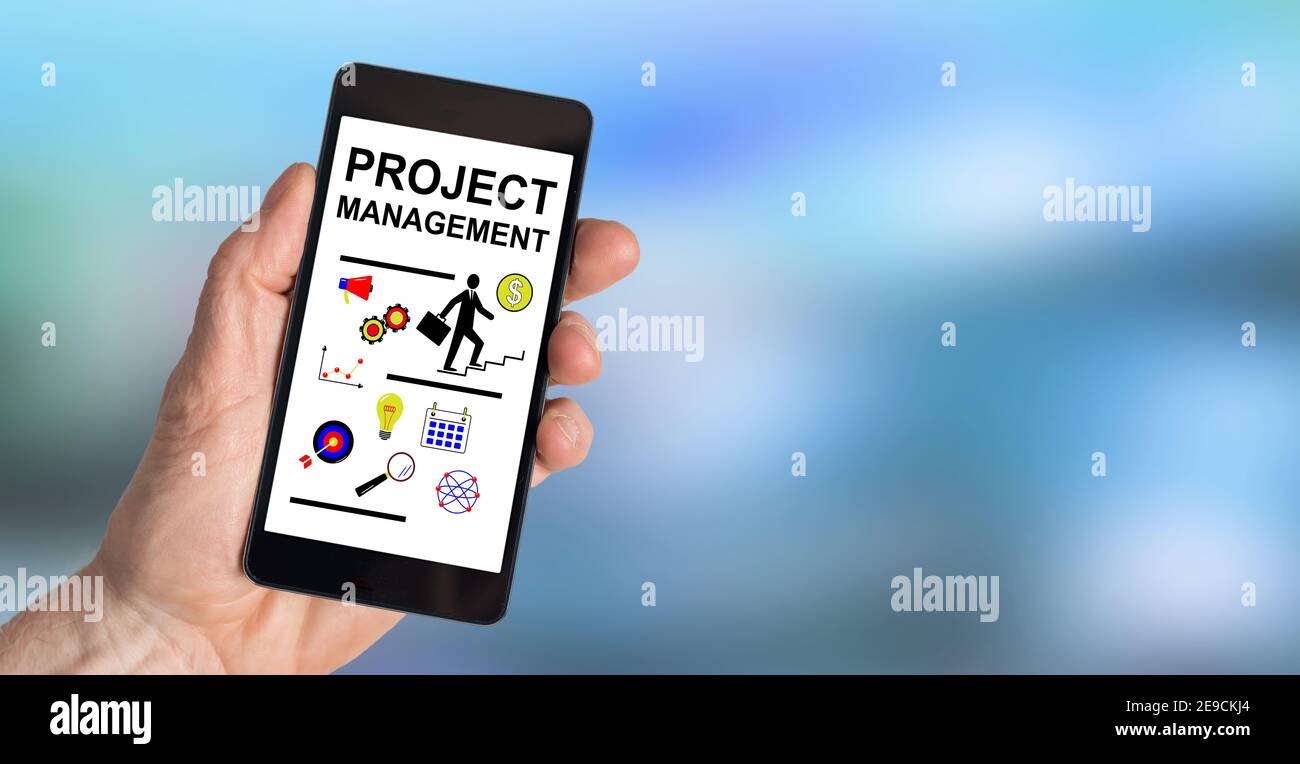 Hand holding a smartphone with project management concept Stock Photo ...