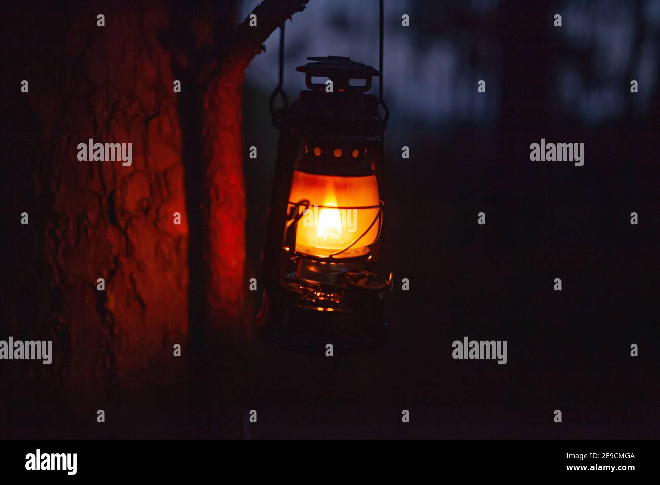 Classic fire lantern for light on night at forest Stock Photo - Alamy