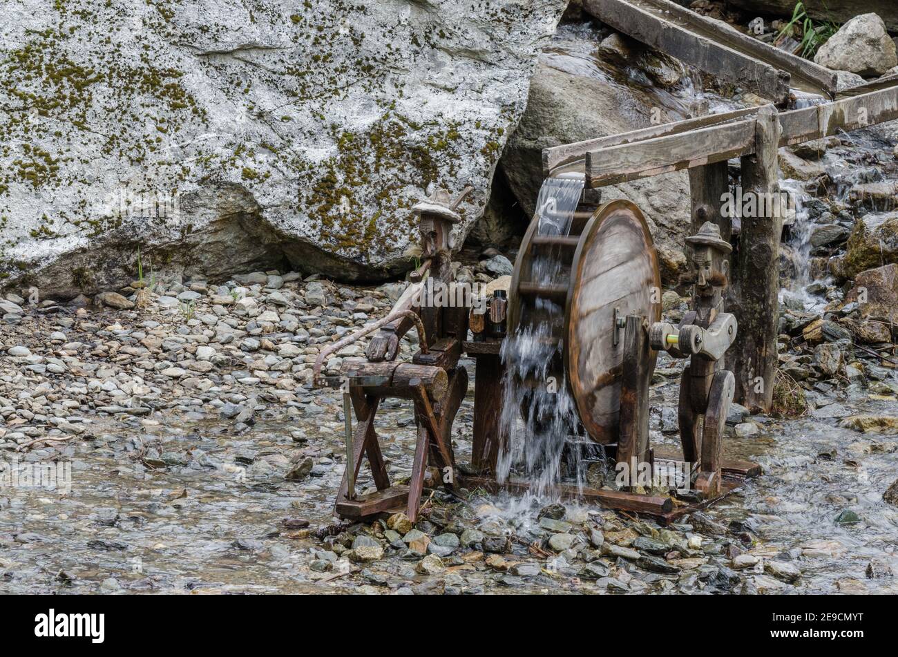 wooden construction of a waterwheel with stream Stock Photo - Alamy