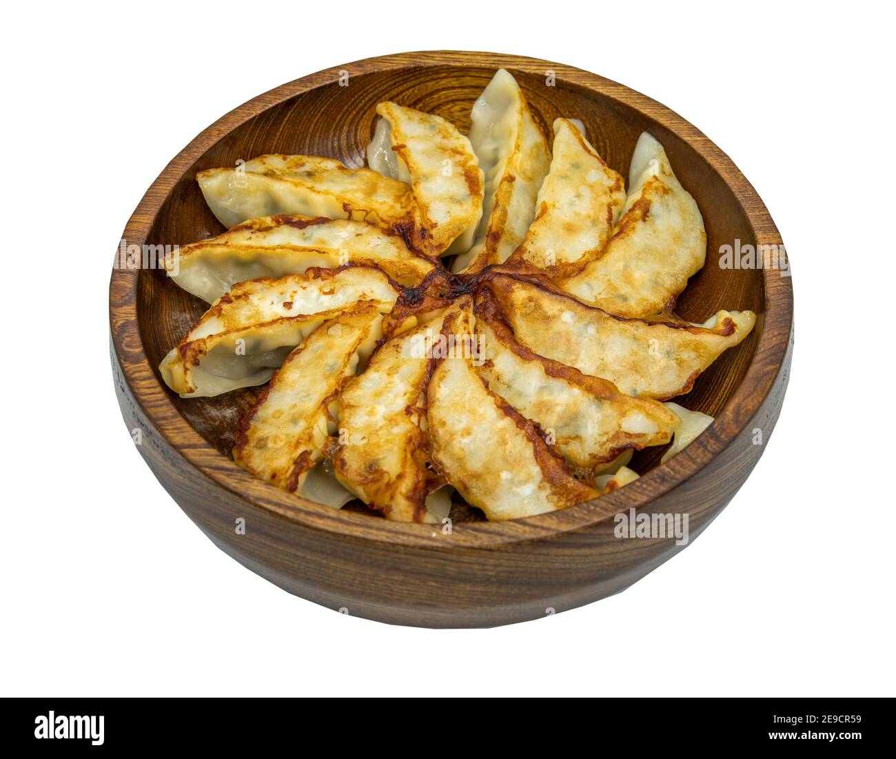 Asian dinner : Fried japanese gyoza dumplings on wooden bowl isolated ...