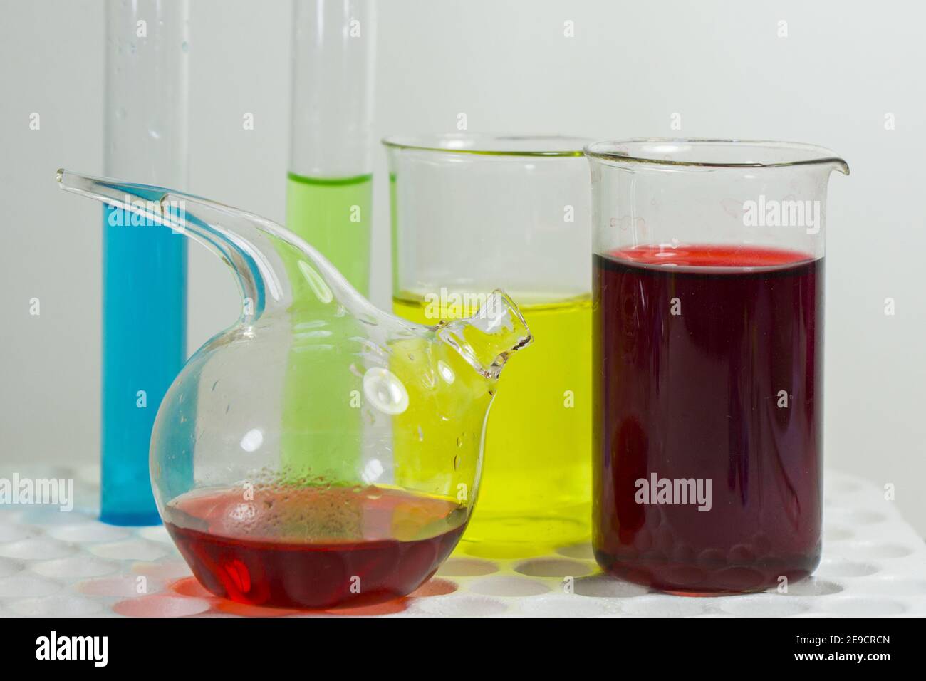 Closeup of laboratory chemical liquid elements in glassware Stock Photo ...