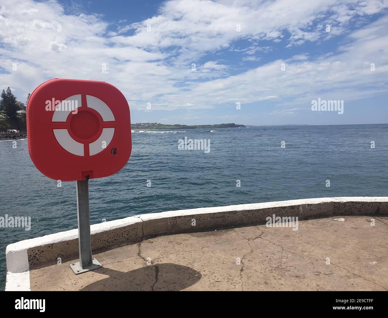 View of a red lifeguard ring post in Kiama South Coast, Australia Stock ...