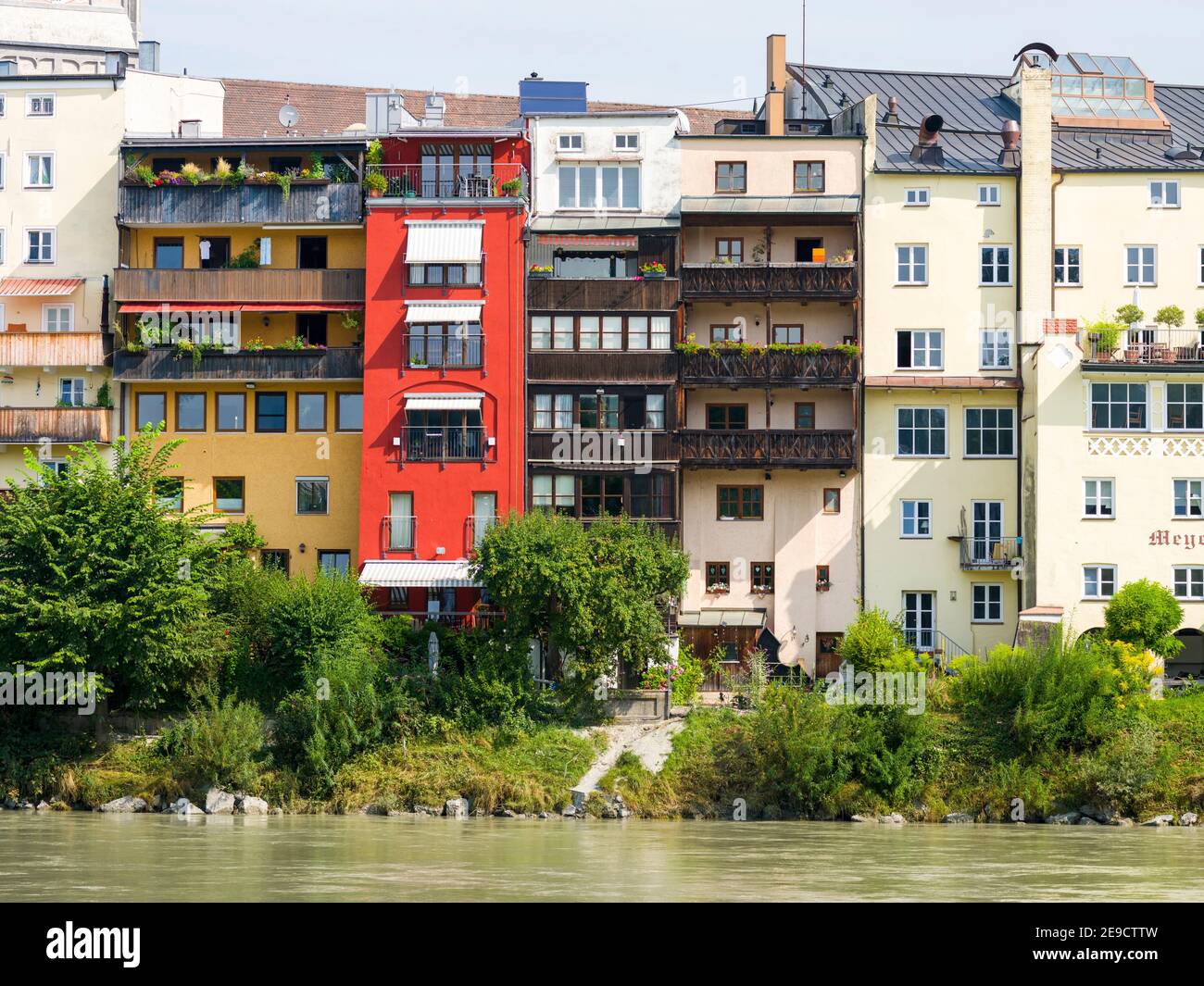 The famous waterfront and river Inn. The medieval old town of ...