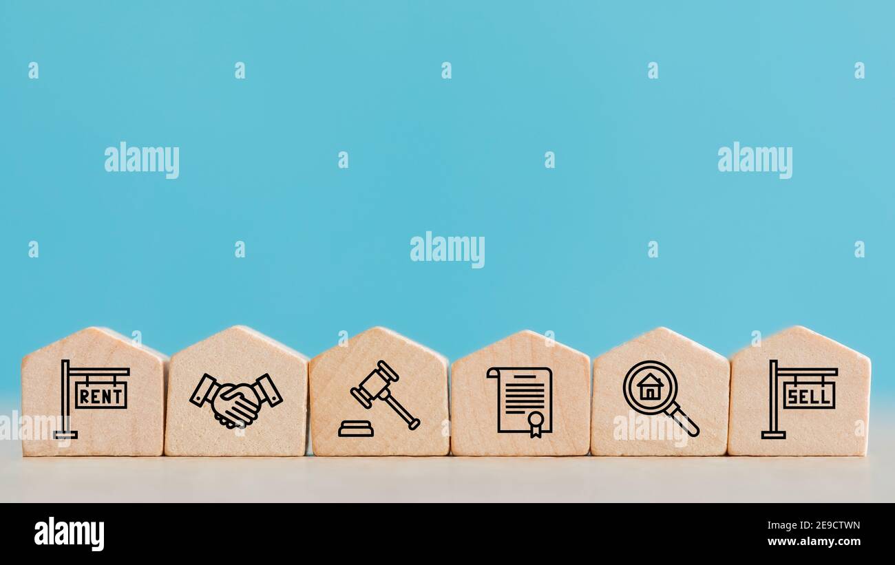 Wooden blocks showing different aspects of real estate Stock Photo - Alamy