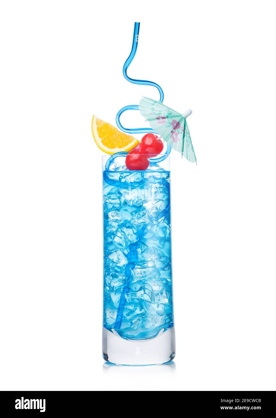 Blue lagoon cocktail highball glass with straw and orange slice with ...