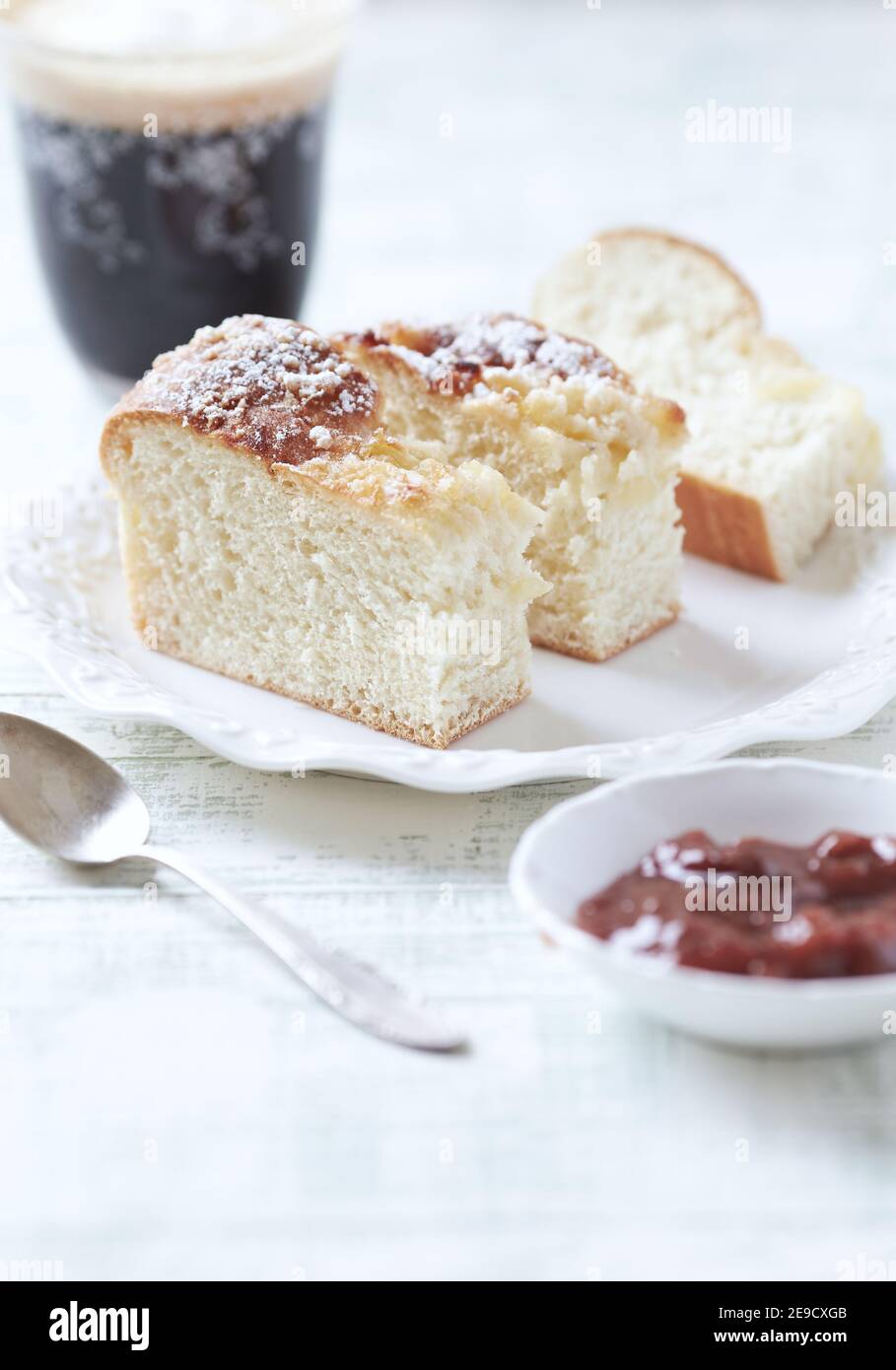 Simple yeast cake on bright background. Front view. Close up Stock ...