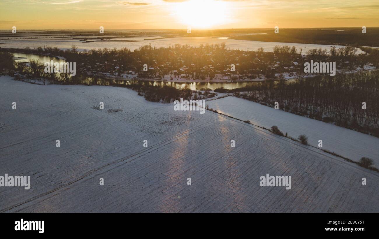 Aerial view of snowy fields at sunrise hi-res stock photography and ...