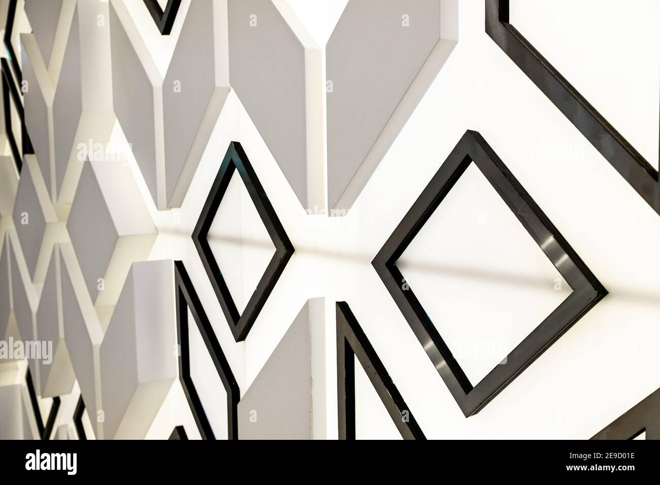 Photo of the surface of a luminous wall with three-dimensional shapes ...