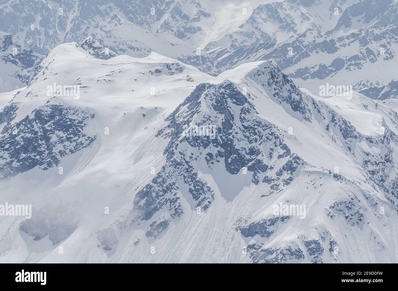 high mountains with lots of snow Stock Photo - Alamy