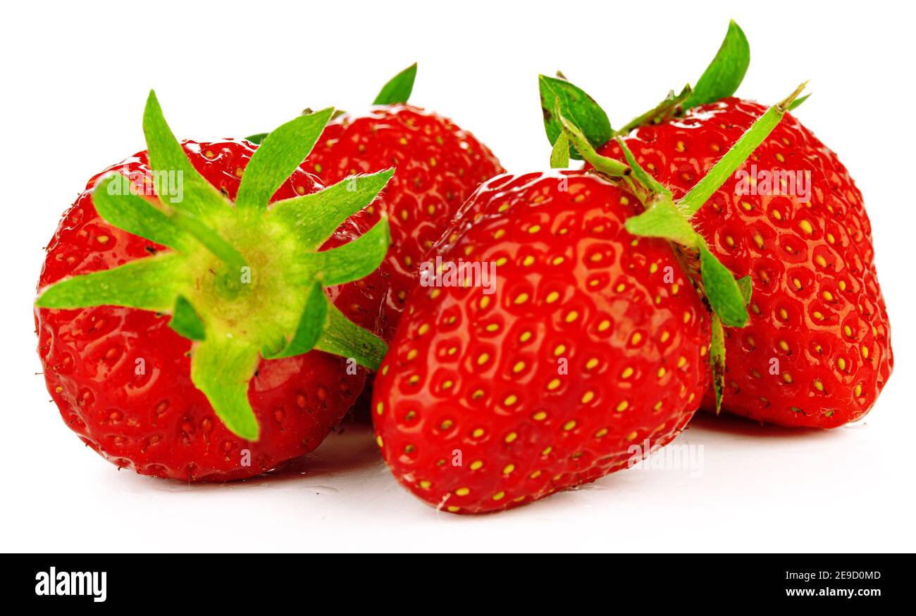 Group of strawberries with leaves isolated on a white background Stock ...