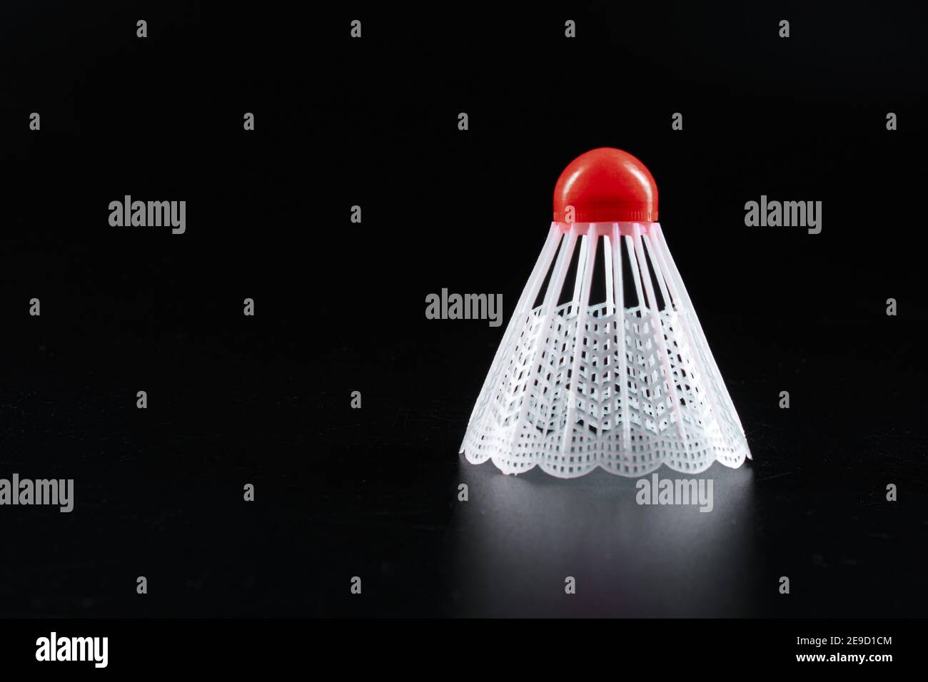 Badminton sport equipment on dark black background Stock Photo - Alamy