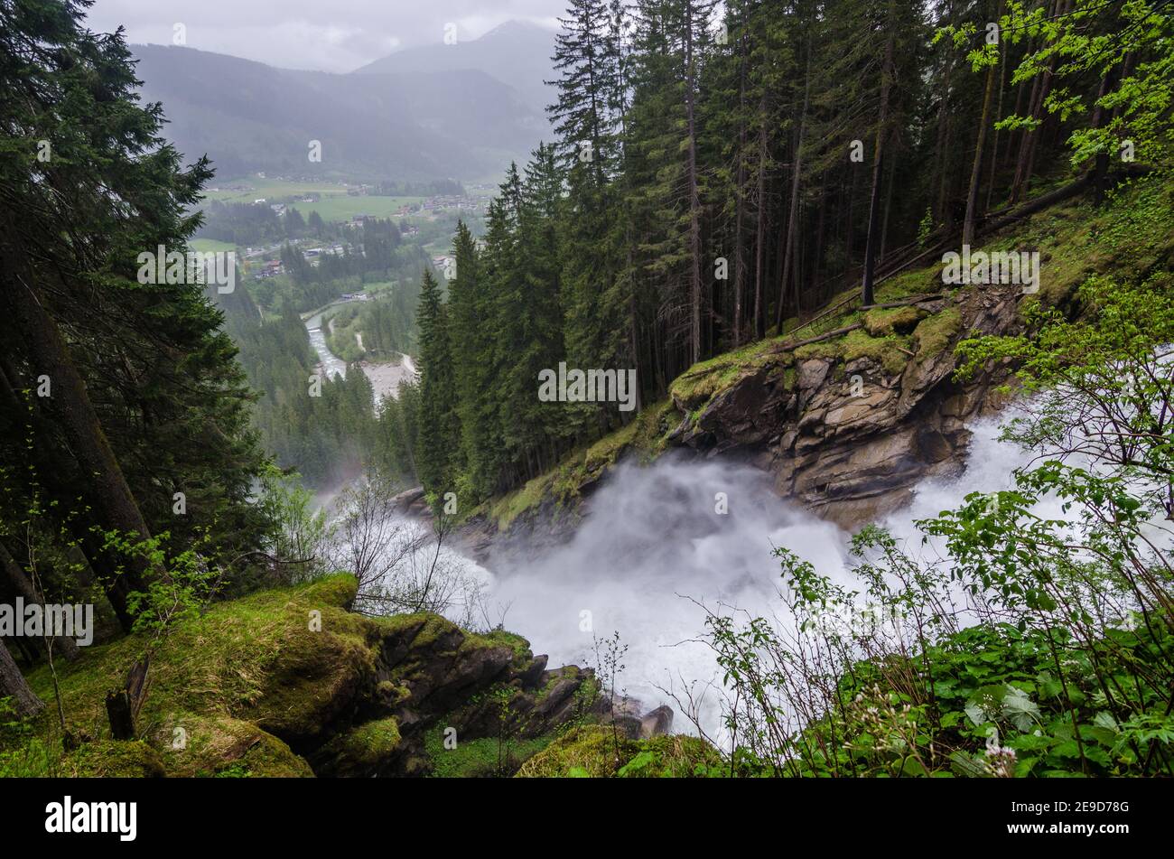 beautiful waterfall down into the valley Stock Photo - Alamy