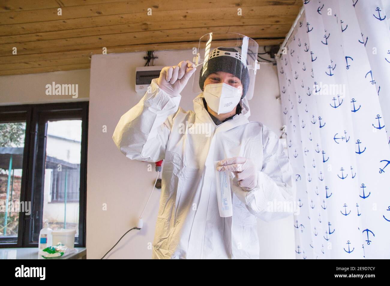 A medic takes a sample for PCR test at the sampling point for testing ...