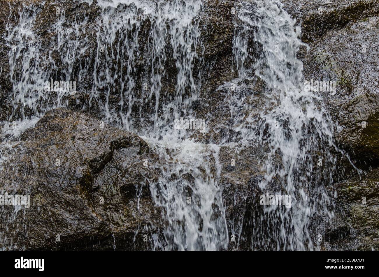 water trickles down rock in a waterfall Stock Photo - Alamy