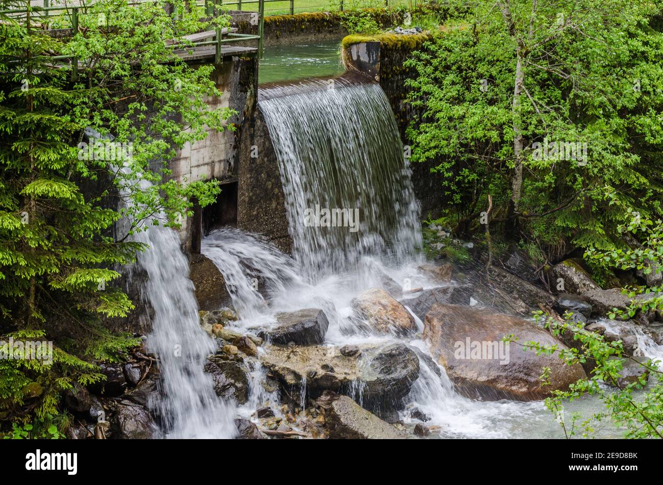 sluice at the creek in nature Stock Photo - Alamy