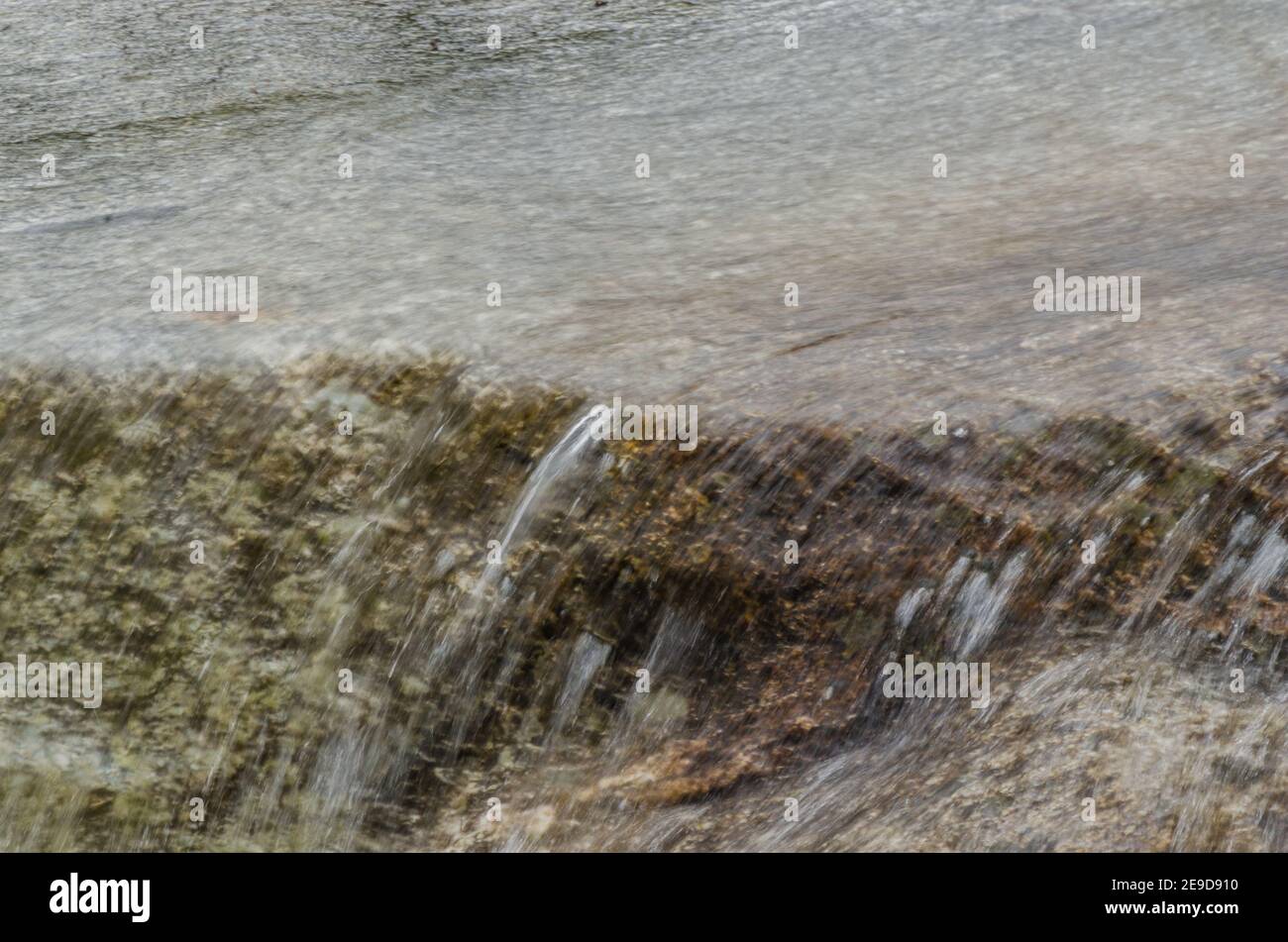 Water splashing over rocks tropical hi-res stock photography and images ...