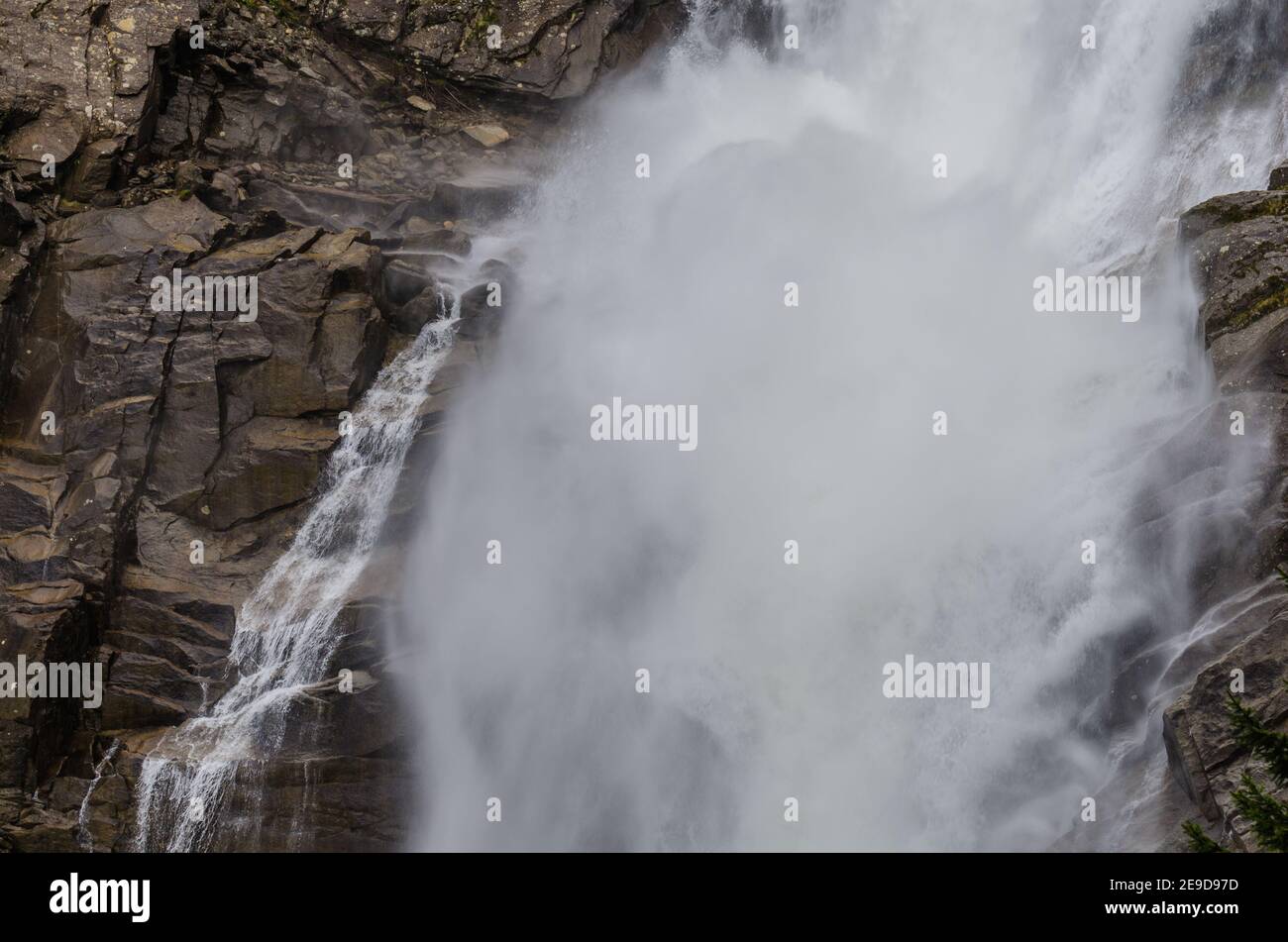 atomized water of waterfall at rocks Stock Photo - Alamy