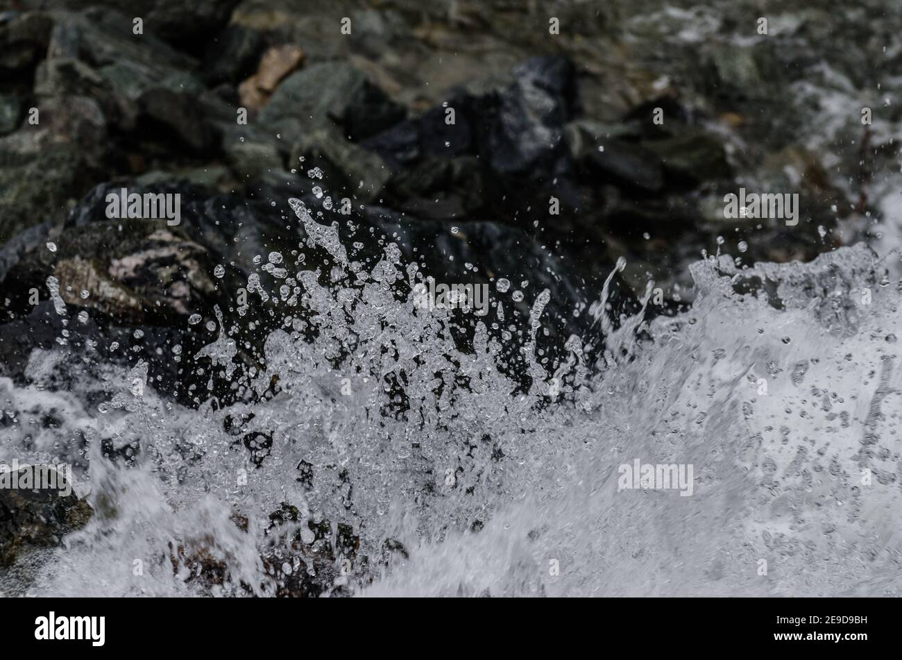 wild splashing water at a waterfall Stock Photo - Alamy
